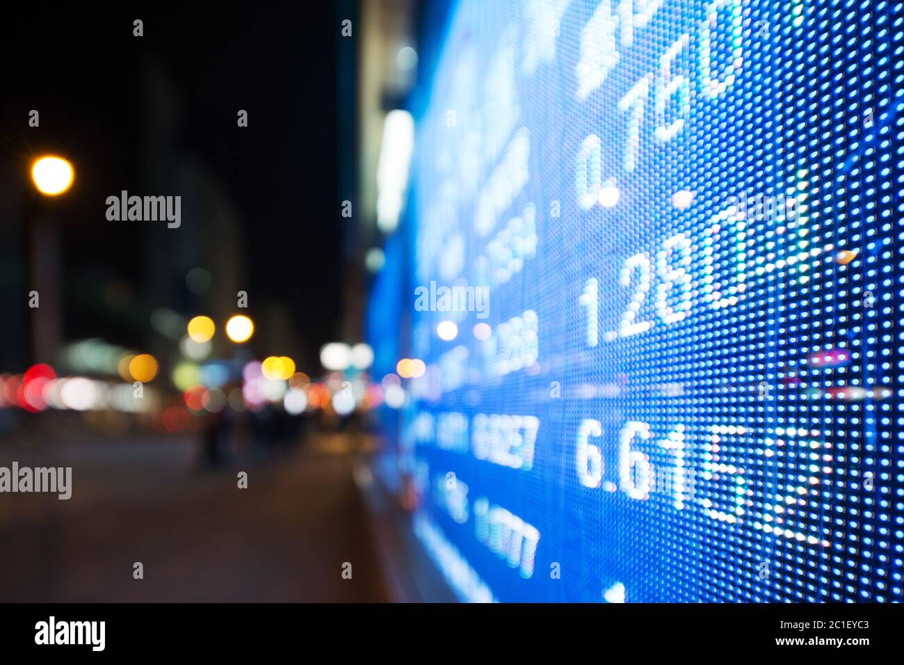 Display of Stock market quotes beside street Stock Photo - Alamy
