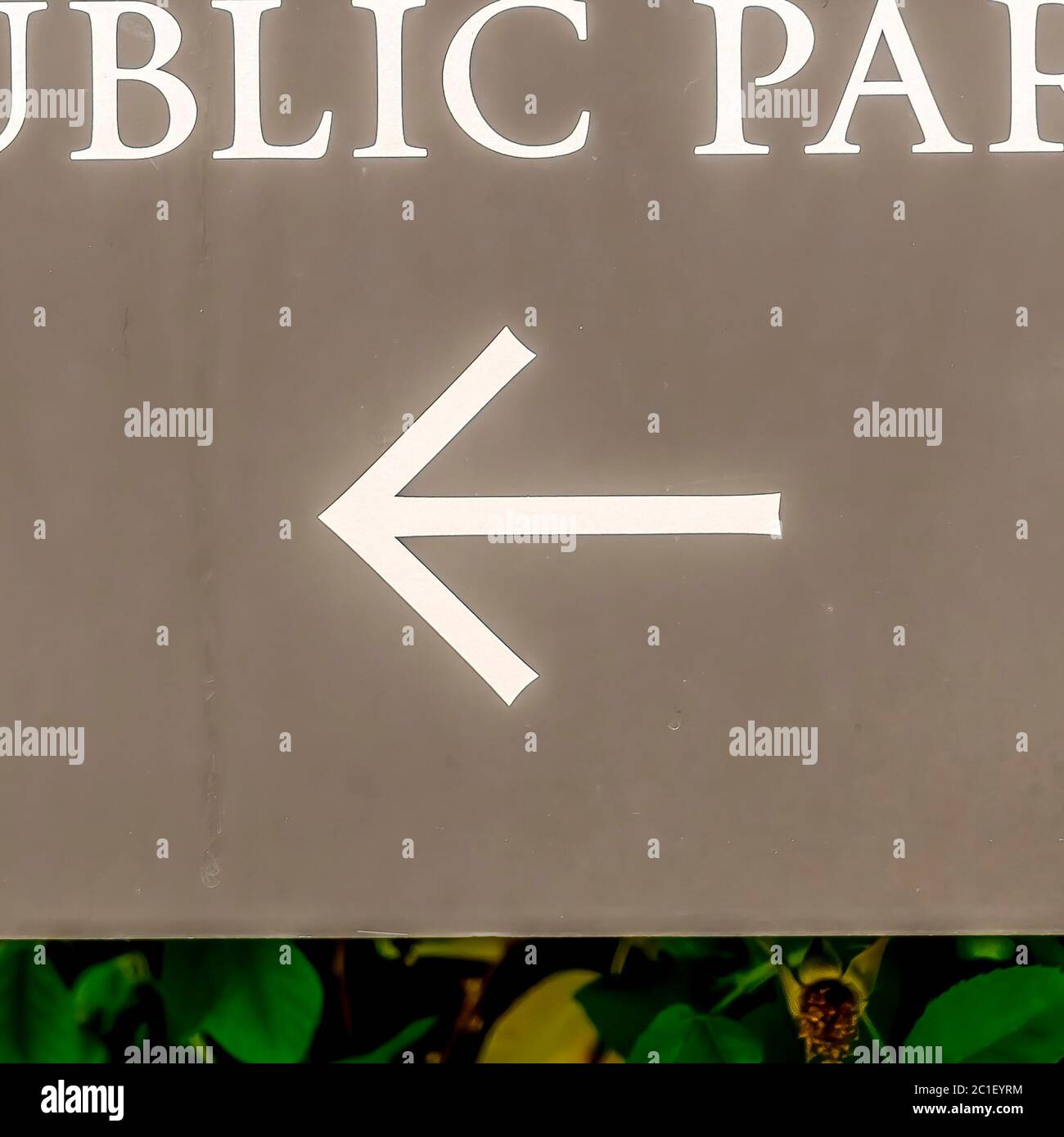 Square No Public parking sign with arrow at the Receiving area outside ...