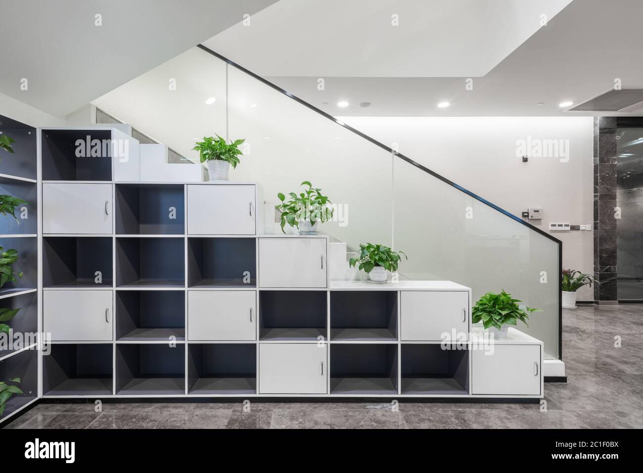 Office building glass stairway hi-res stock photography and images - Alamy