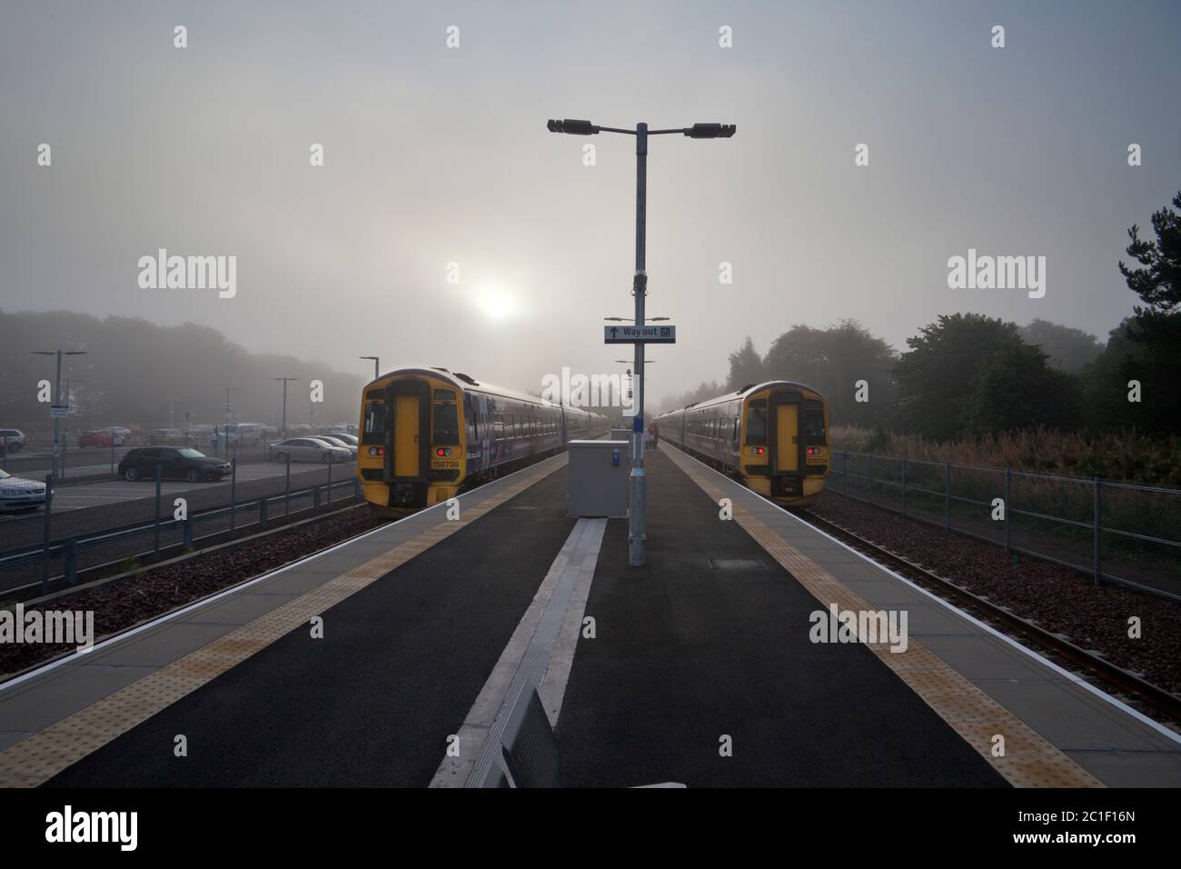 Scotrail class 158 sprinter trains waiting at a misty Tweedbank railway ...