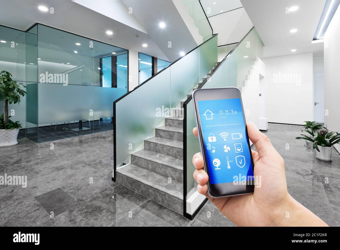 mobile phont with smart home in modern office Stock Photo - Alamy