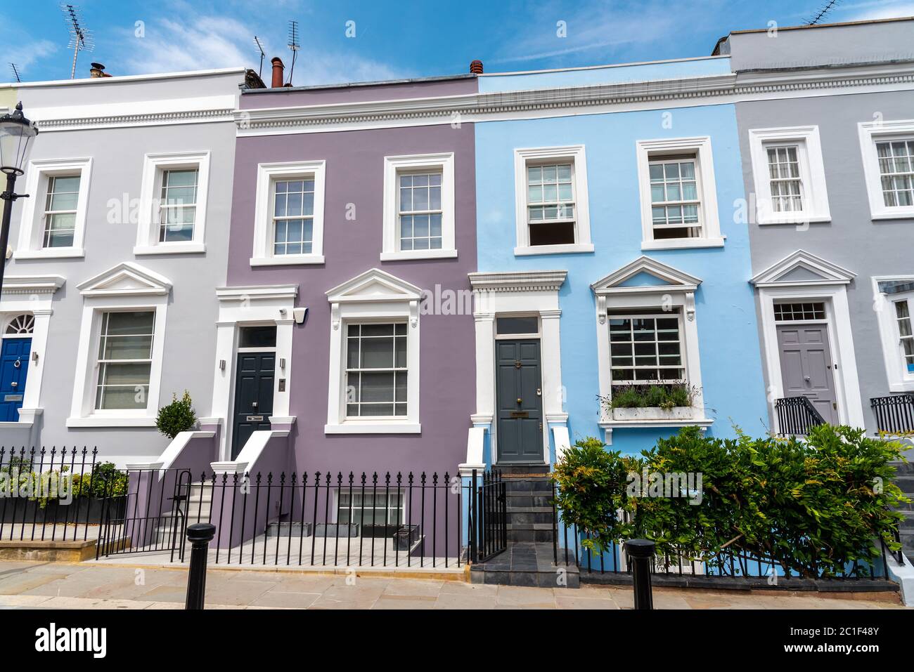 Colorful row houses seen in Notting Hill, London Stock Photo - Alamy