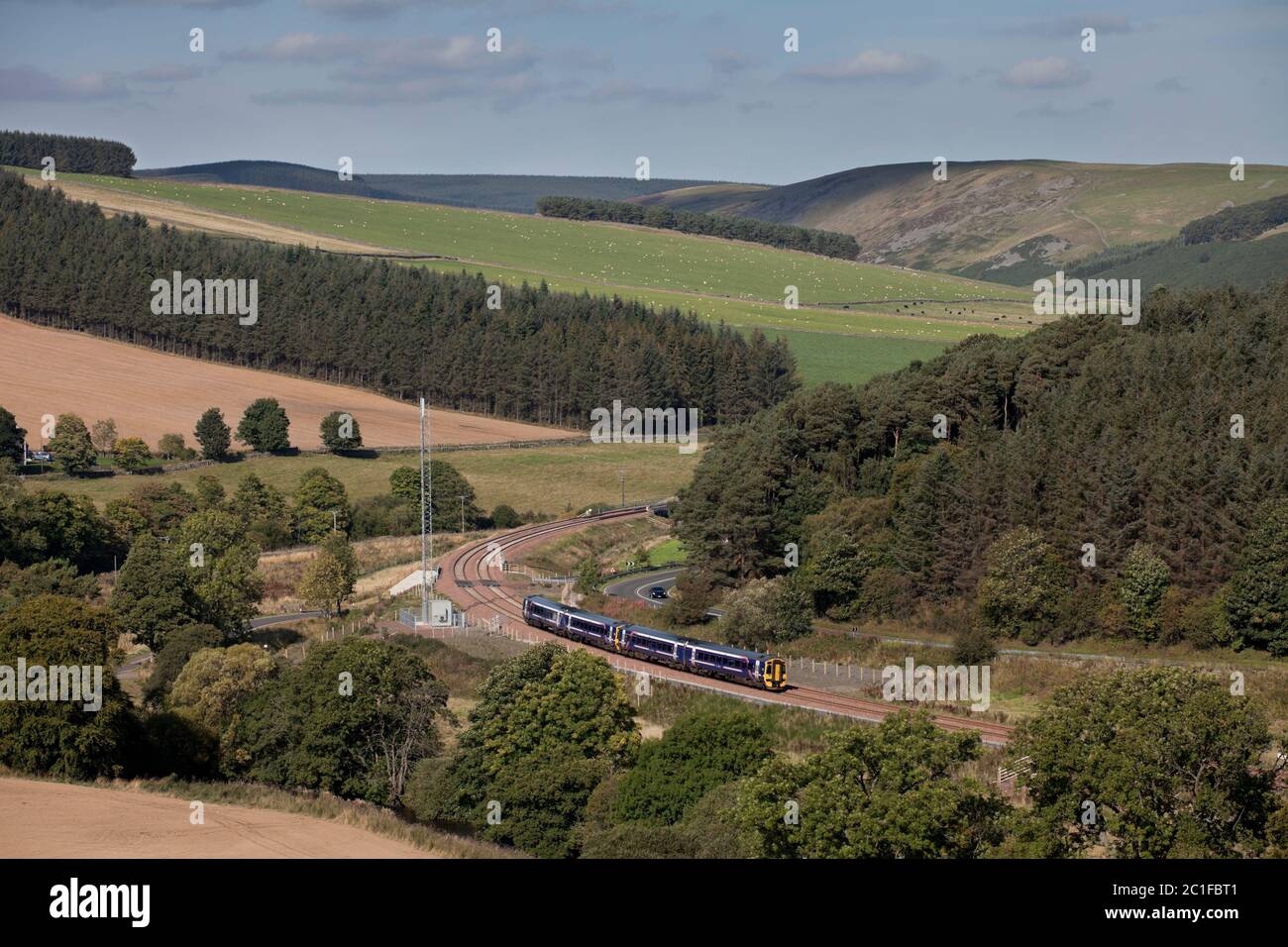 2 Scotrail class 158 trains passing Bowshank on the borders railway ...