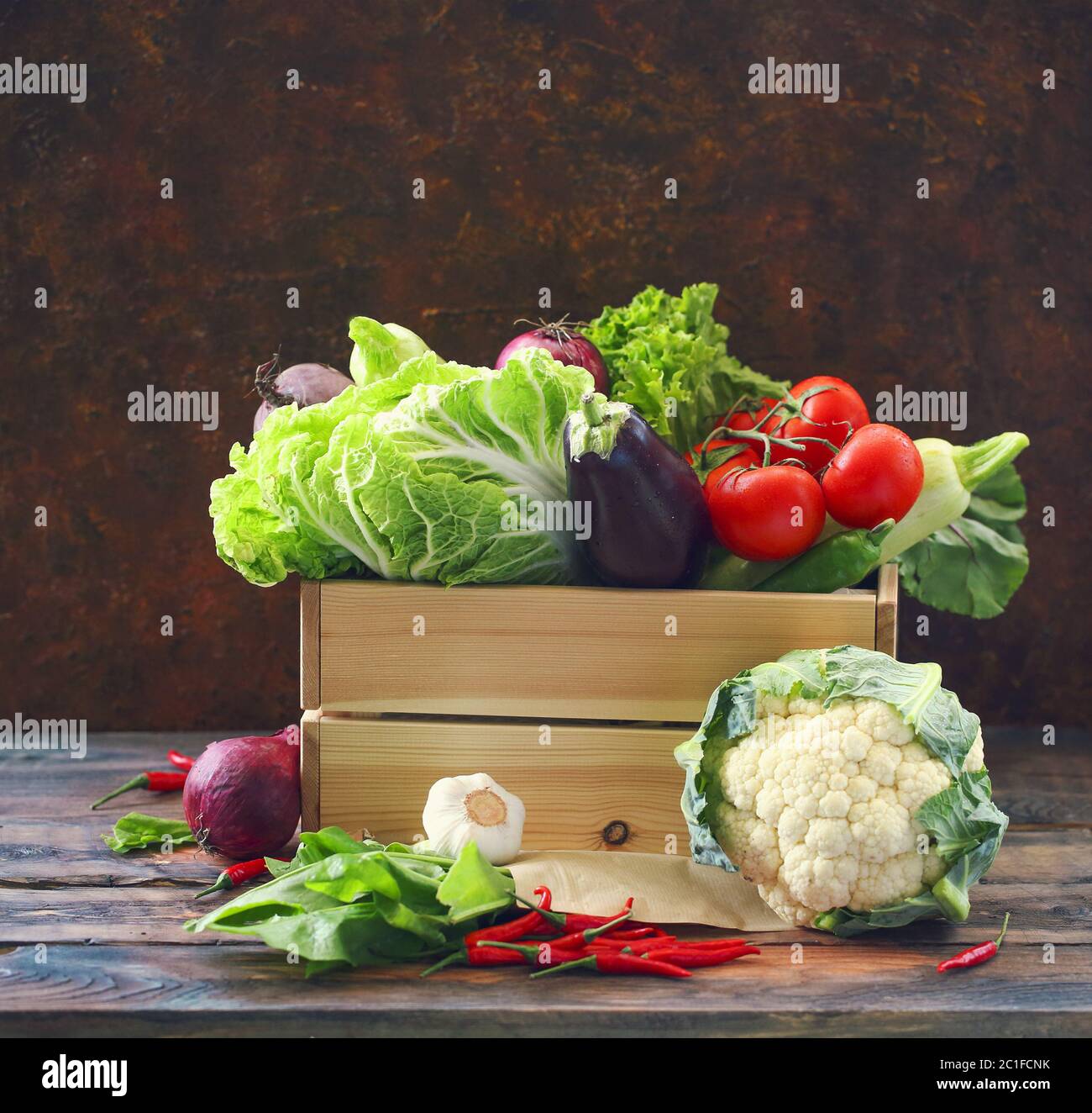 Organic raw vegitables in wooden box. Healthy diet and nutrition ...