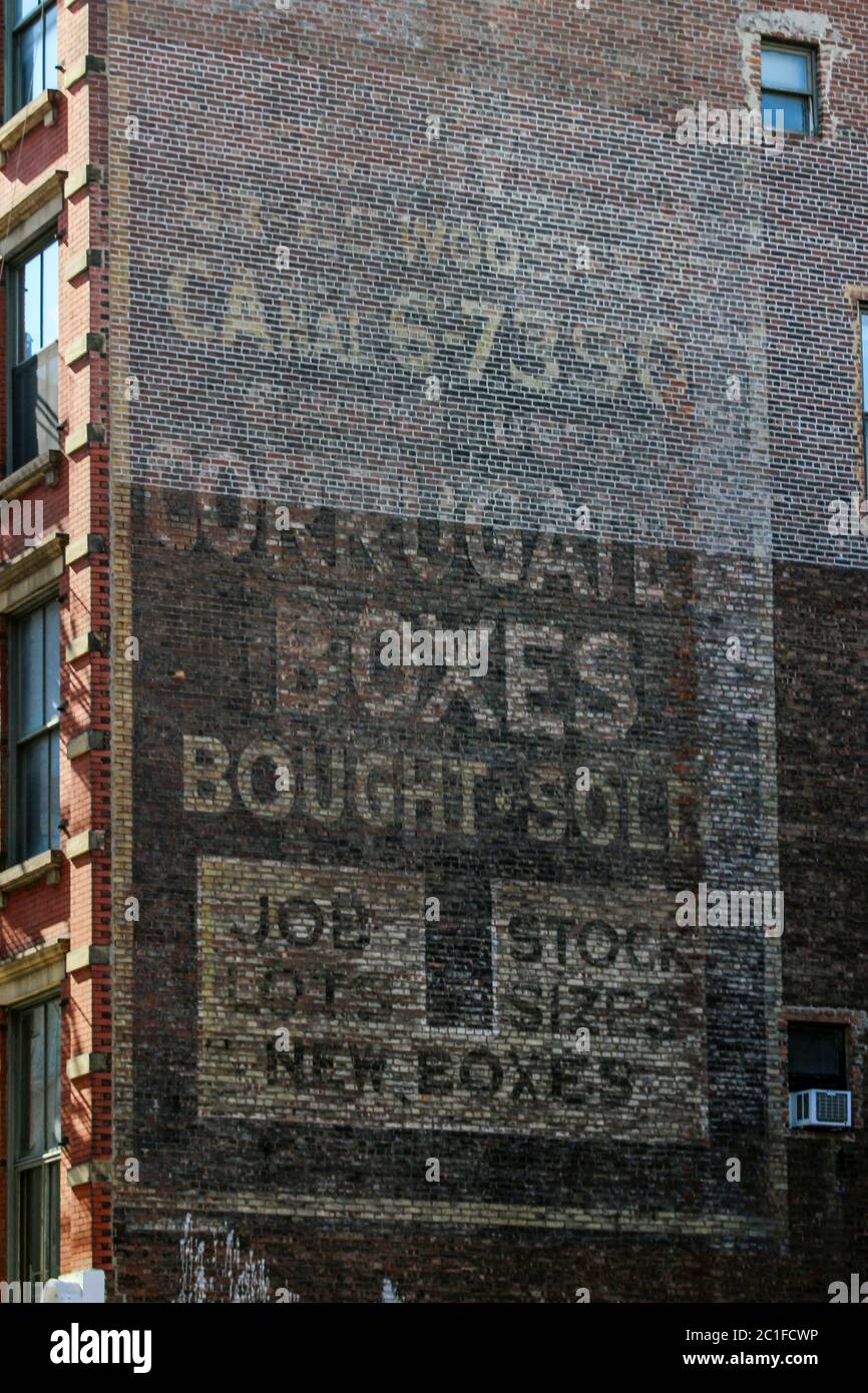 Old hand-painted advertising sign,so called ghost sign or ghost mural ...