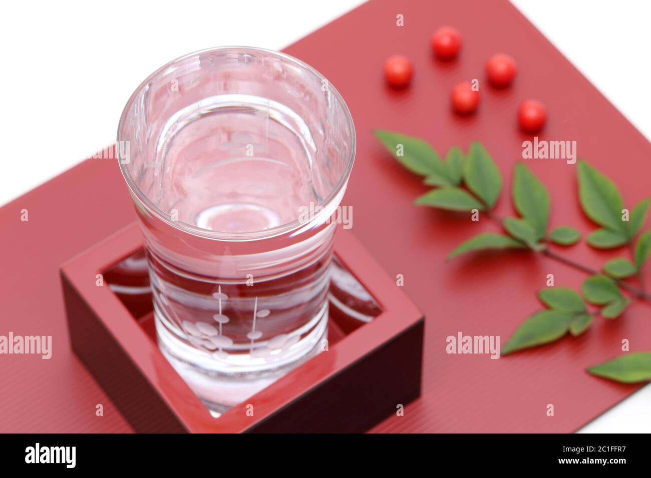 Japanese wooden box masu with sake isolated on white background Stock ...