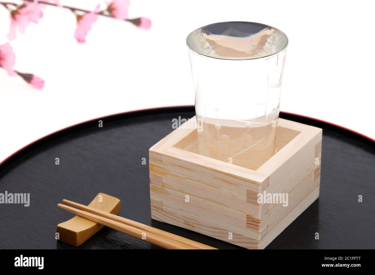 japanese wooden box masu with sake isolated on white background Stock ...