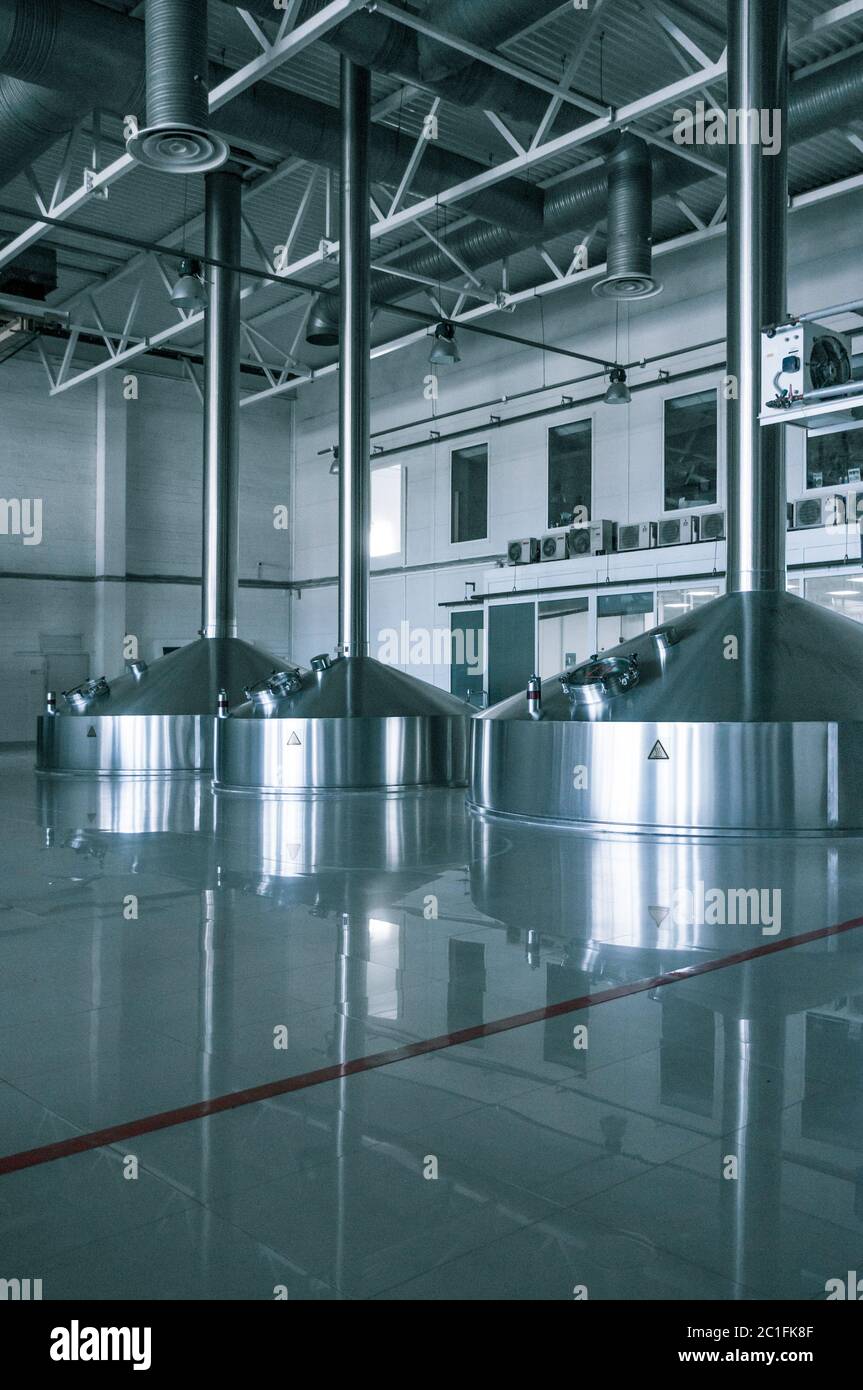 Modern interior of a brewery mash vats metal containers Stock Photo - Alamy
