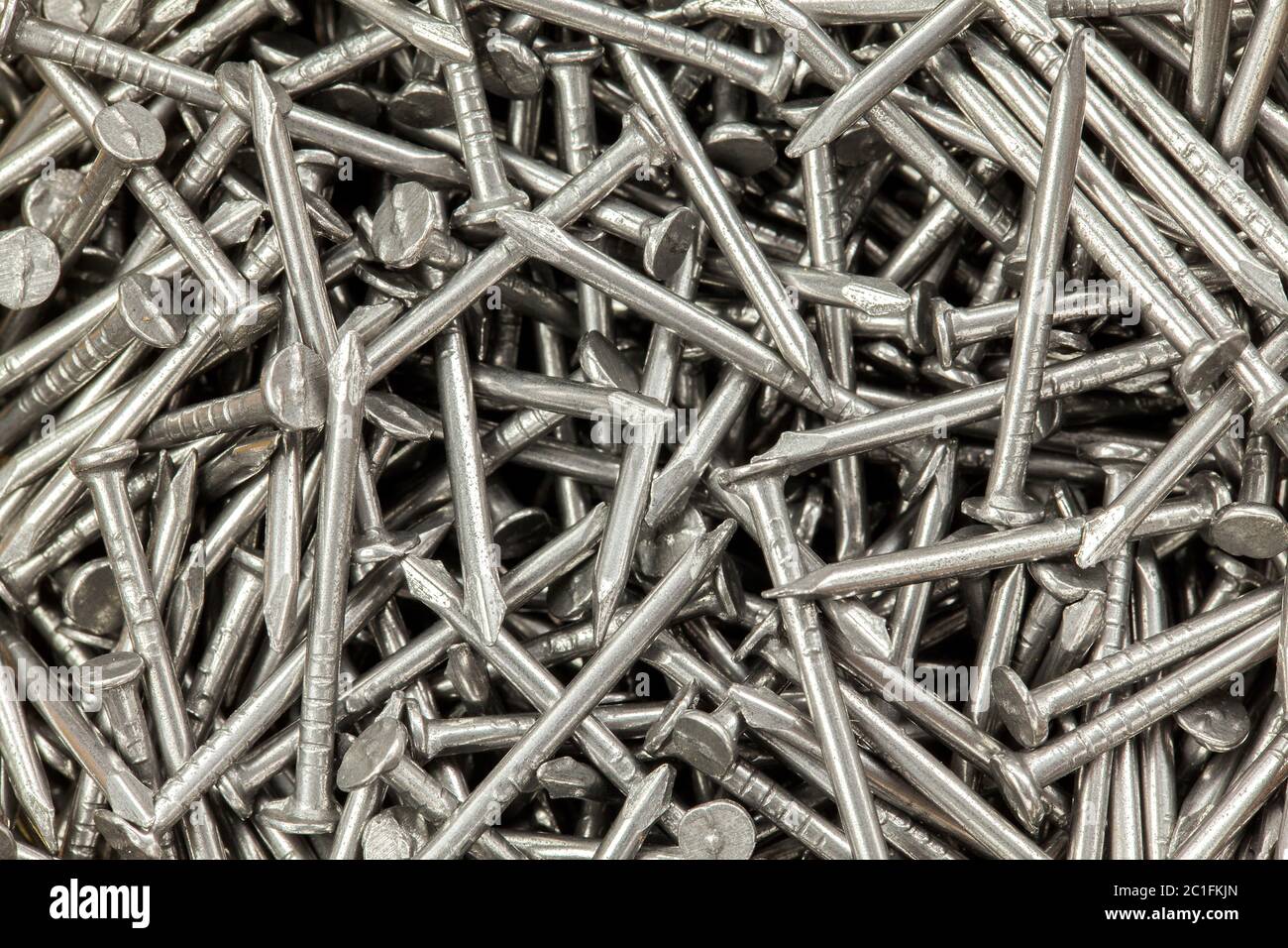 Many steel nails Stock Photo - Alamy