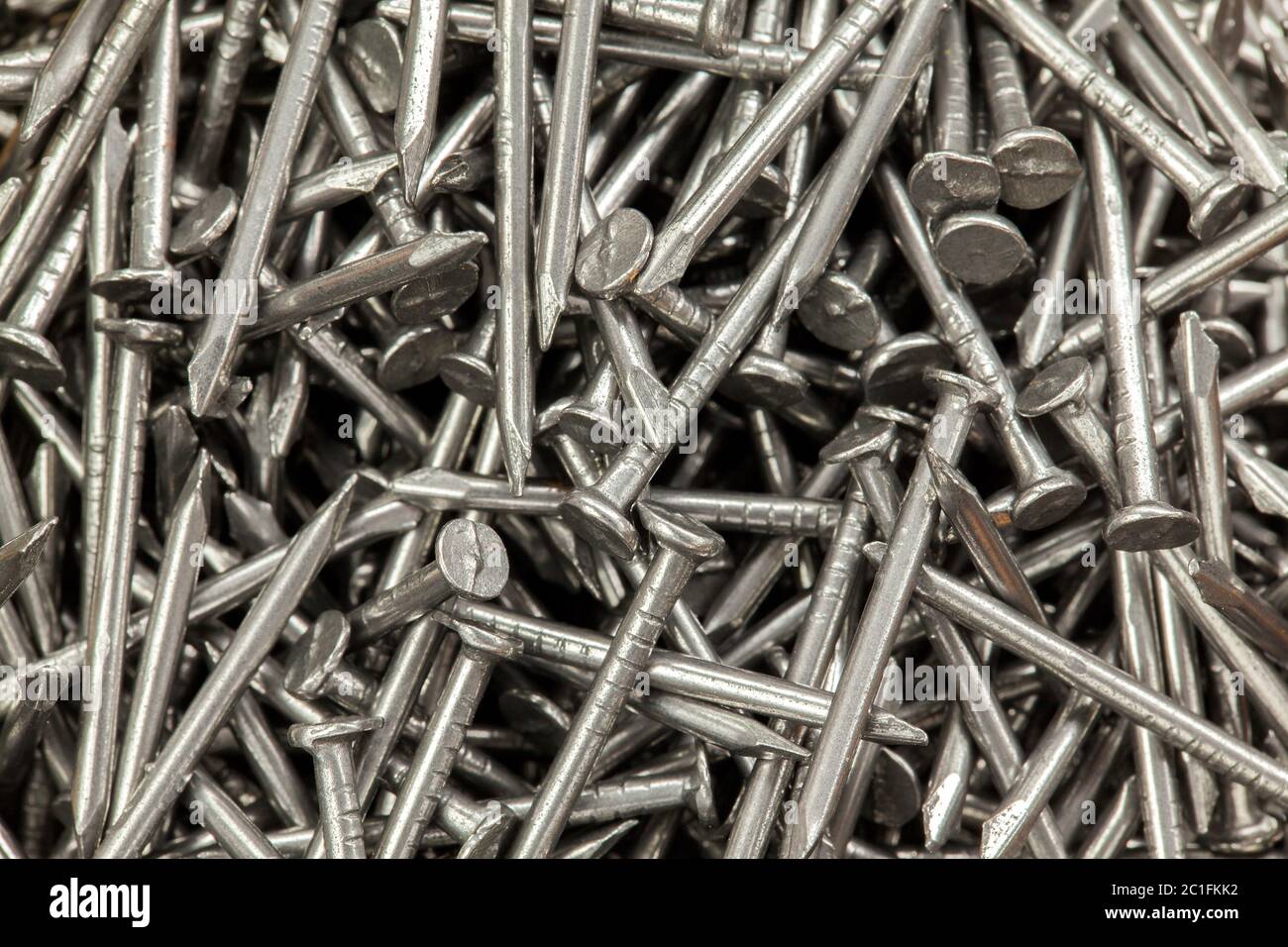 Many steel nails Stock Photo - Alamy