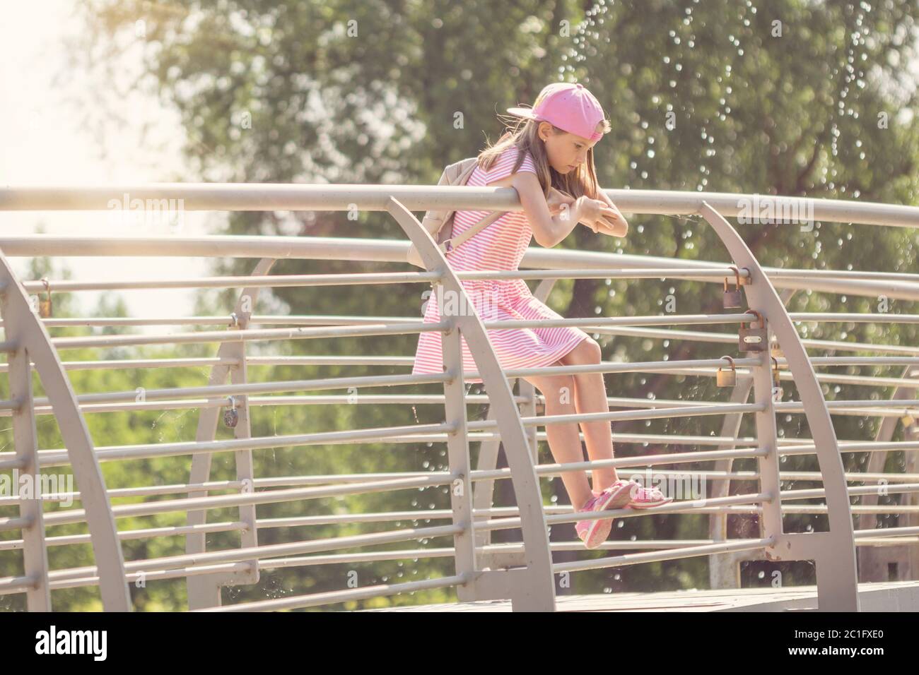 Girl standing bridge hi-res stock photography and images - Alamy