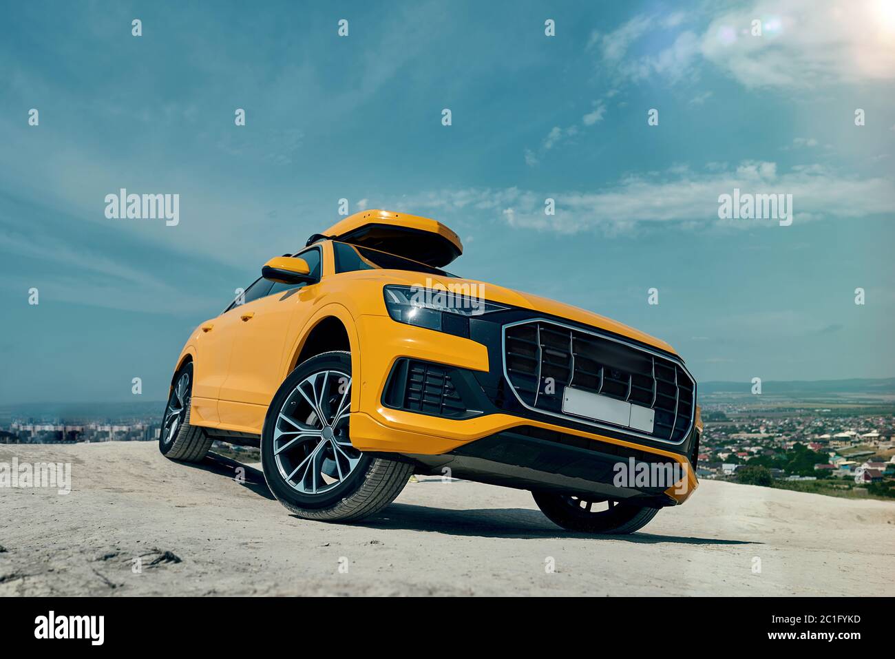 SUV on a rock by the sea Stock Photo - Alamy