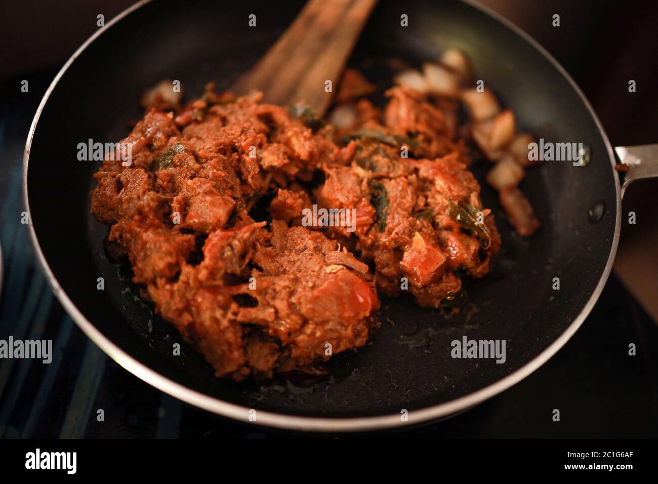 South Indian dish spicy beef fry Kerala, India. side dish ghee rice ...