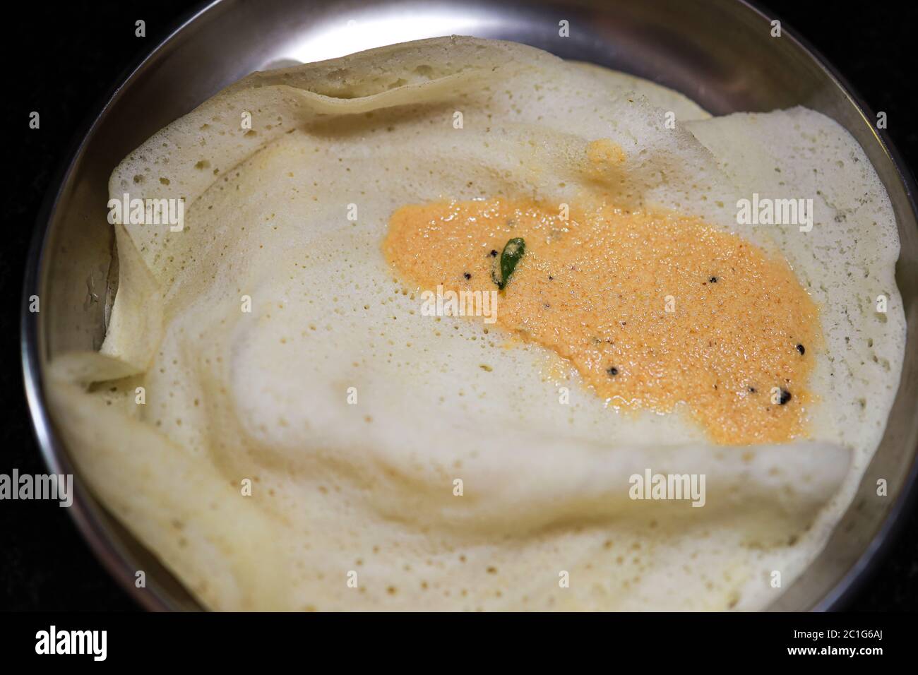 Indian breakfast dosha and coconut chutney Stock Photo - Alamy