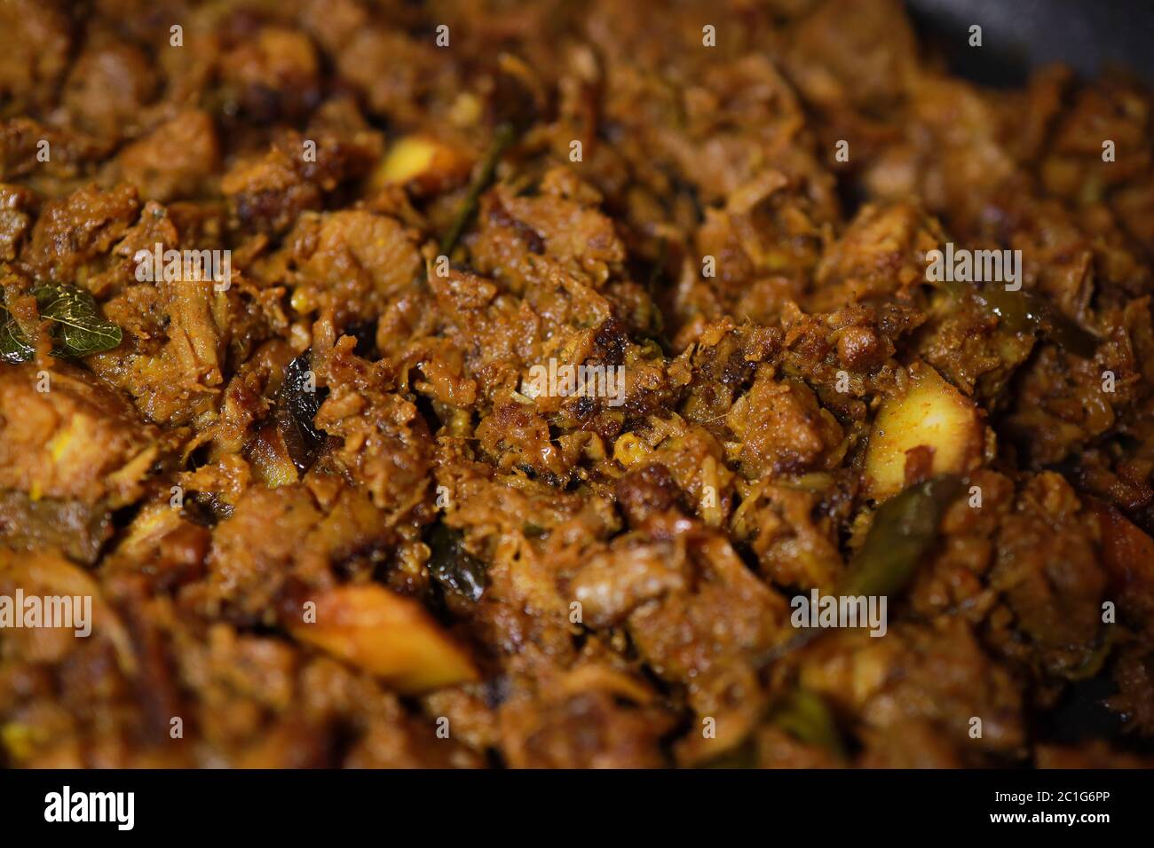 South Indian dish spicy beef fry Kerala, India. side dish ghee rice ...