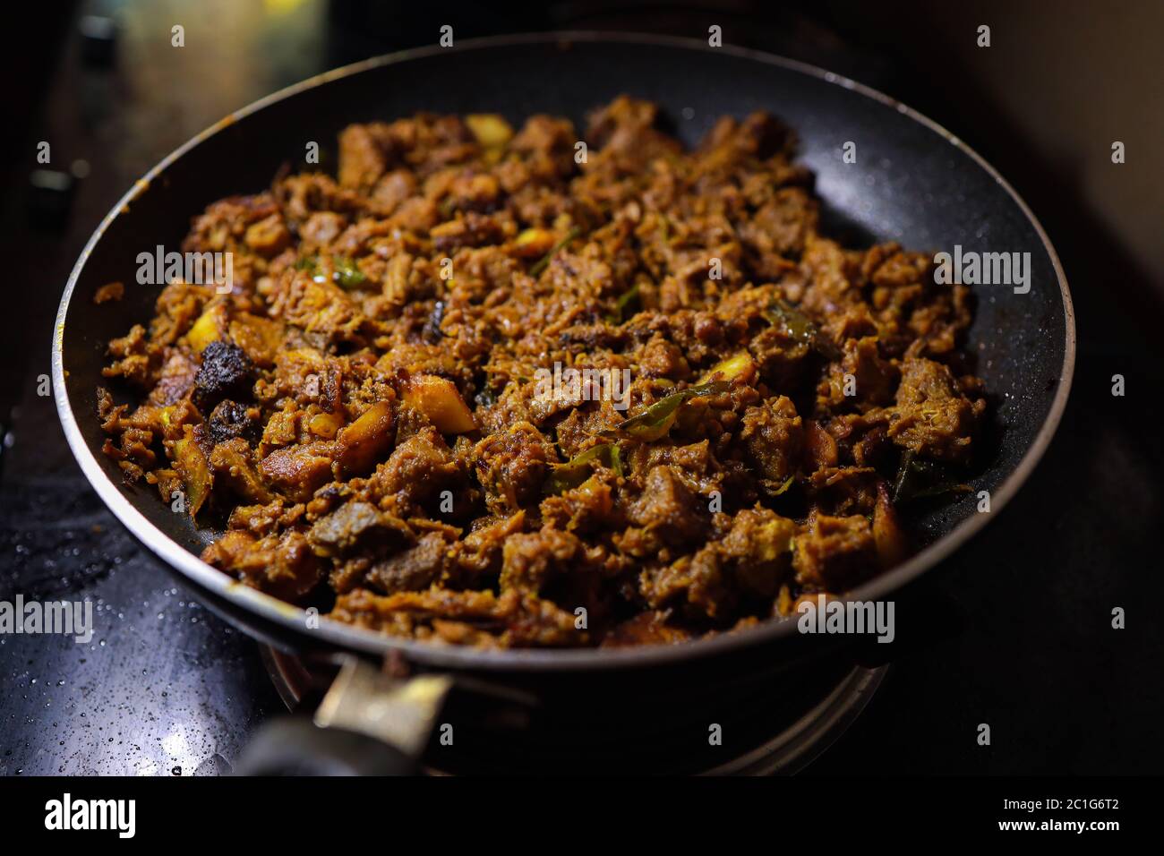 South Indian dish spicy beef fry Kerala, India. side dish ghee rice ...