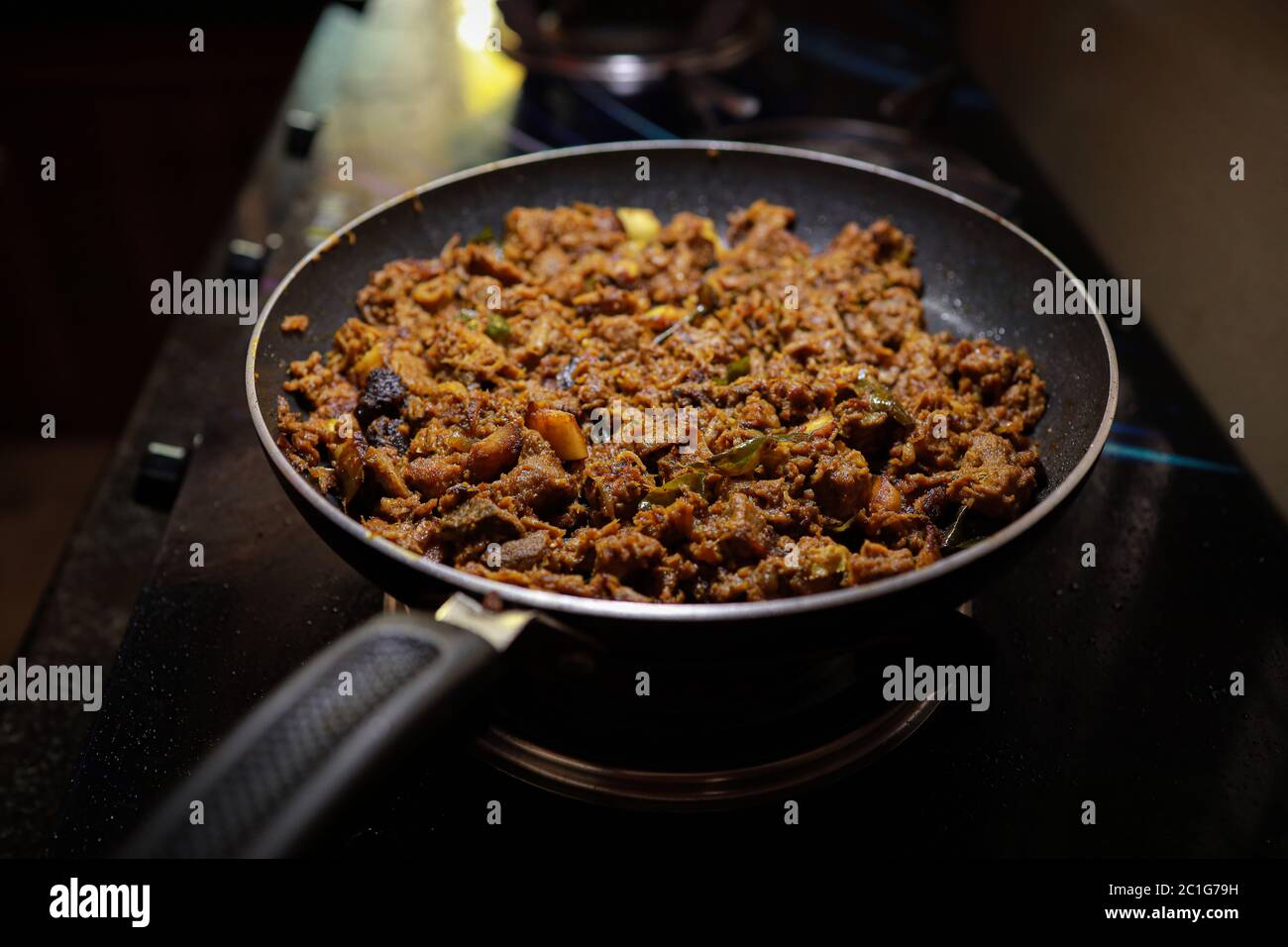 South Indian dish spicy beef fry Kerala, India. side dish ghee rice ...