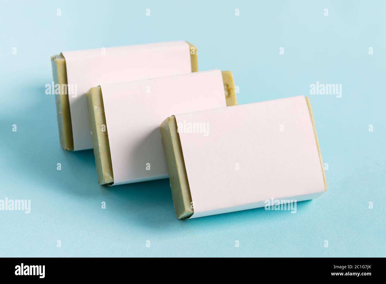 Three soap wrap box mock-up package with bar olive soap isolated on ...