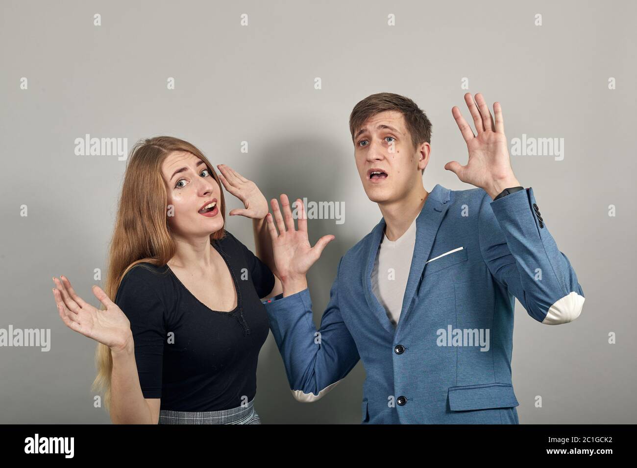 Confused mood spreads hands wide with doubt face. In shock. Sincere ...