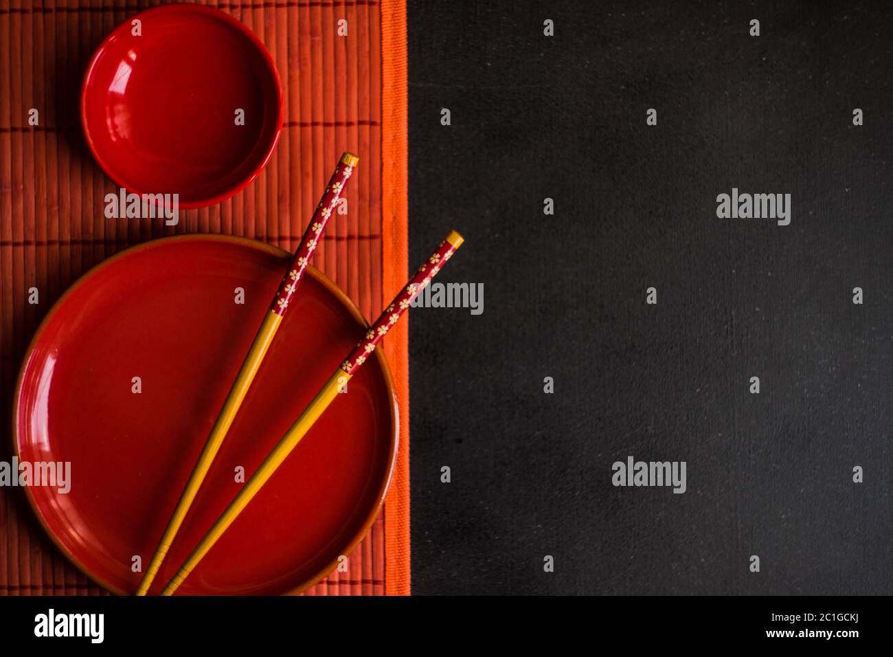 Table setting in red Stock Photo - Alamy