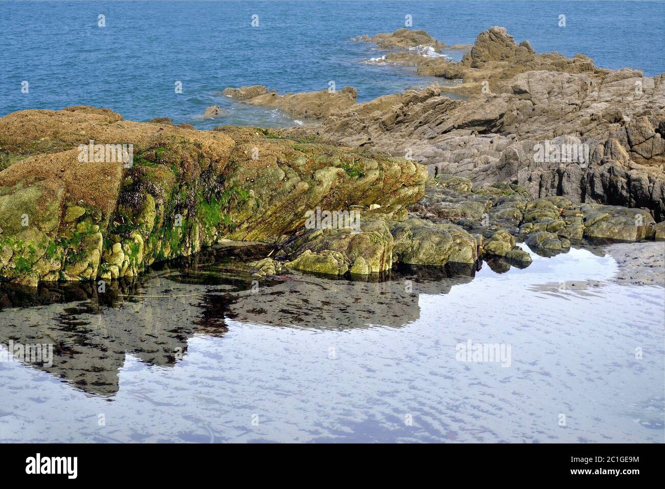 Stone structure from the reef at Pointe du Groin Stock Photo - Alamy