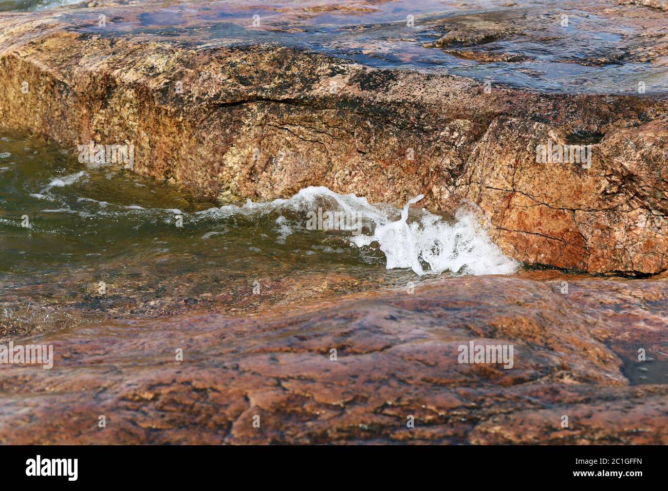 Waves hitting rocks in Helsinki, Finland. Beautiful photo representing ...