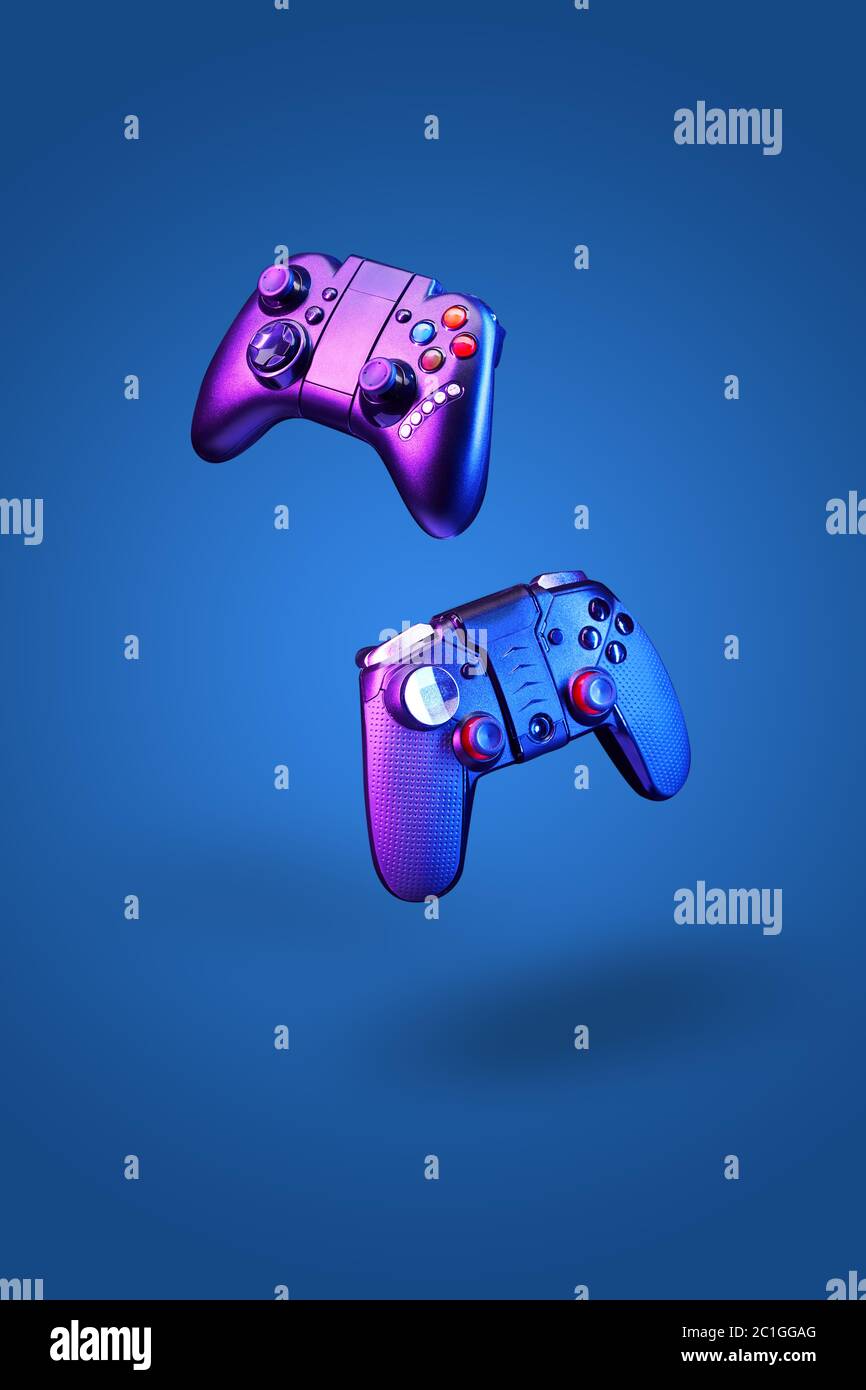 Levitation of two controller joysticks. Concept of gaming and ...