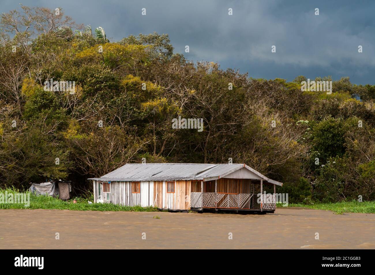 Floating houses in amazon river - Manaus - Brazil Stock Photo - Alamy