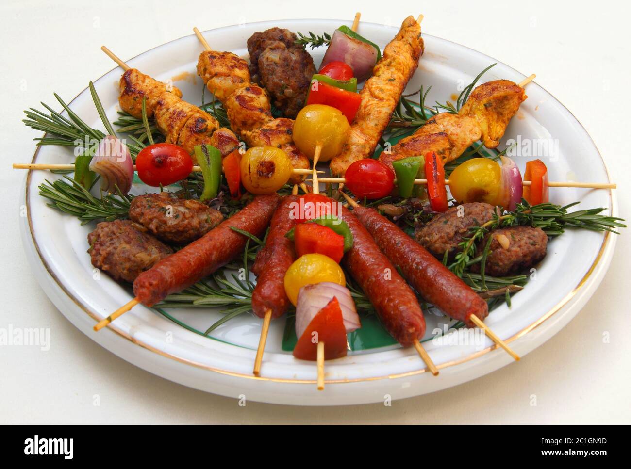 Moroccan food. Mixed grill of skewered meat, kebabs and vegetables ...