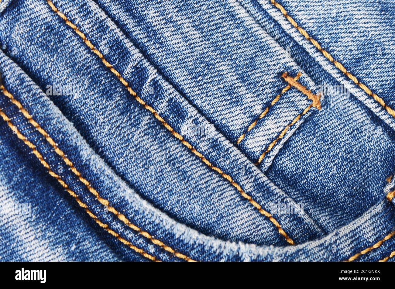 Dark blue female jeans - fabric structure Stock Photo - Alamy