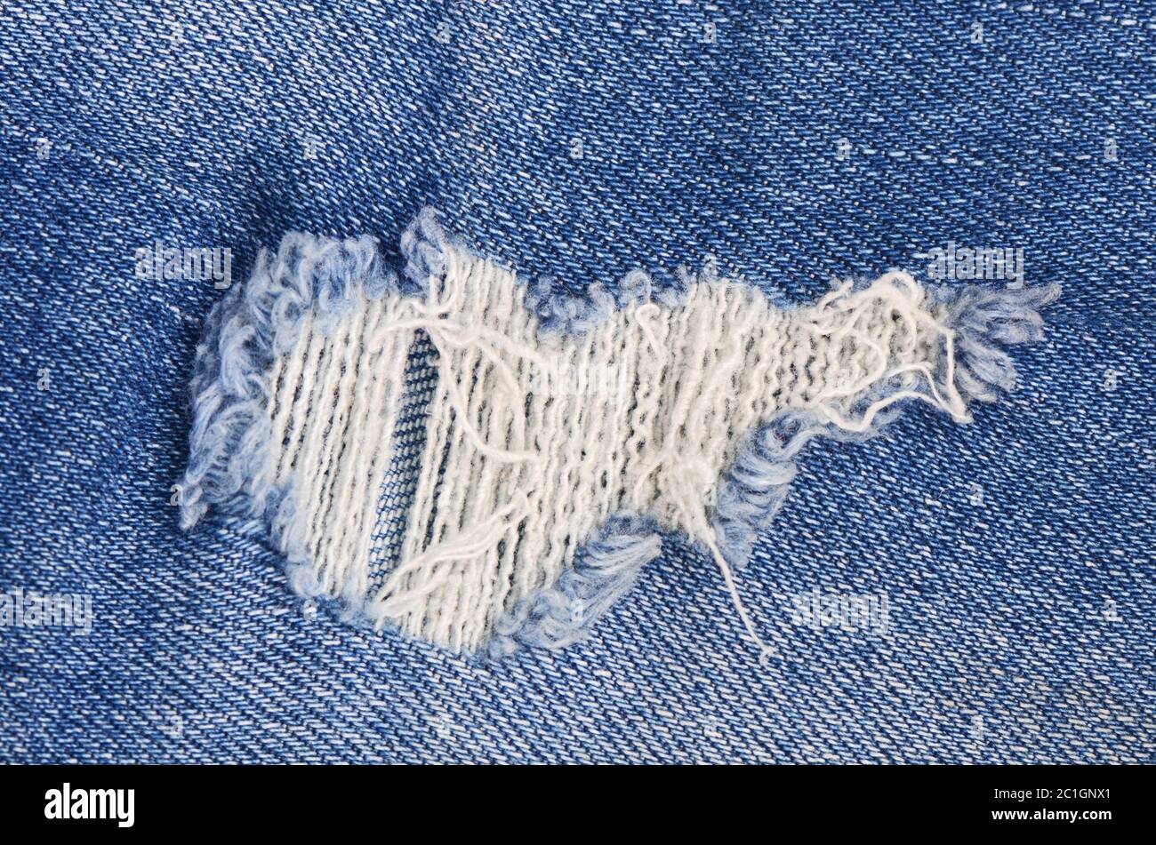 Dark blue female jeans - fabric structure Stock Photo - Alamy