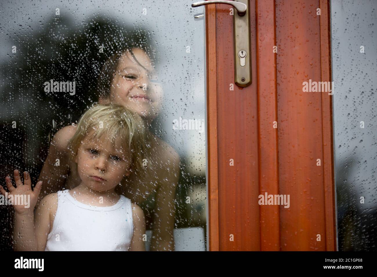 Children window raindrops hi-res stock photography and images - Alamy