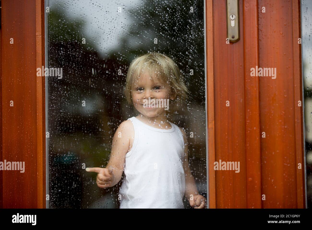 Children watching storm hi-res stock photography and images - Alamy