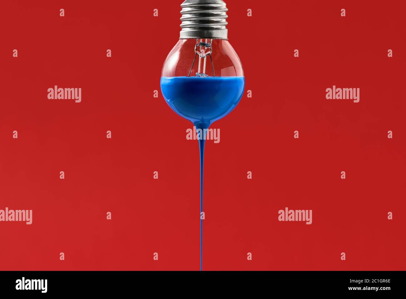 Bulb with blue paint on it Stock Photo - Alamy