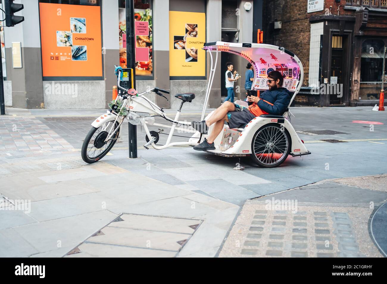 London taxi tricycle hi-res stock photography and images - Alamy