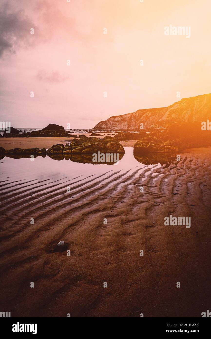 sand and rocks in the beach Stock Photo - Alamy
