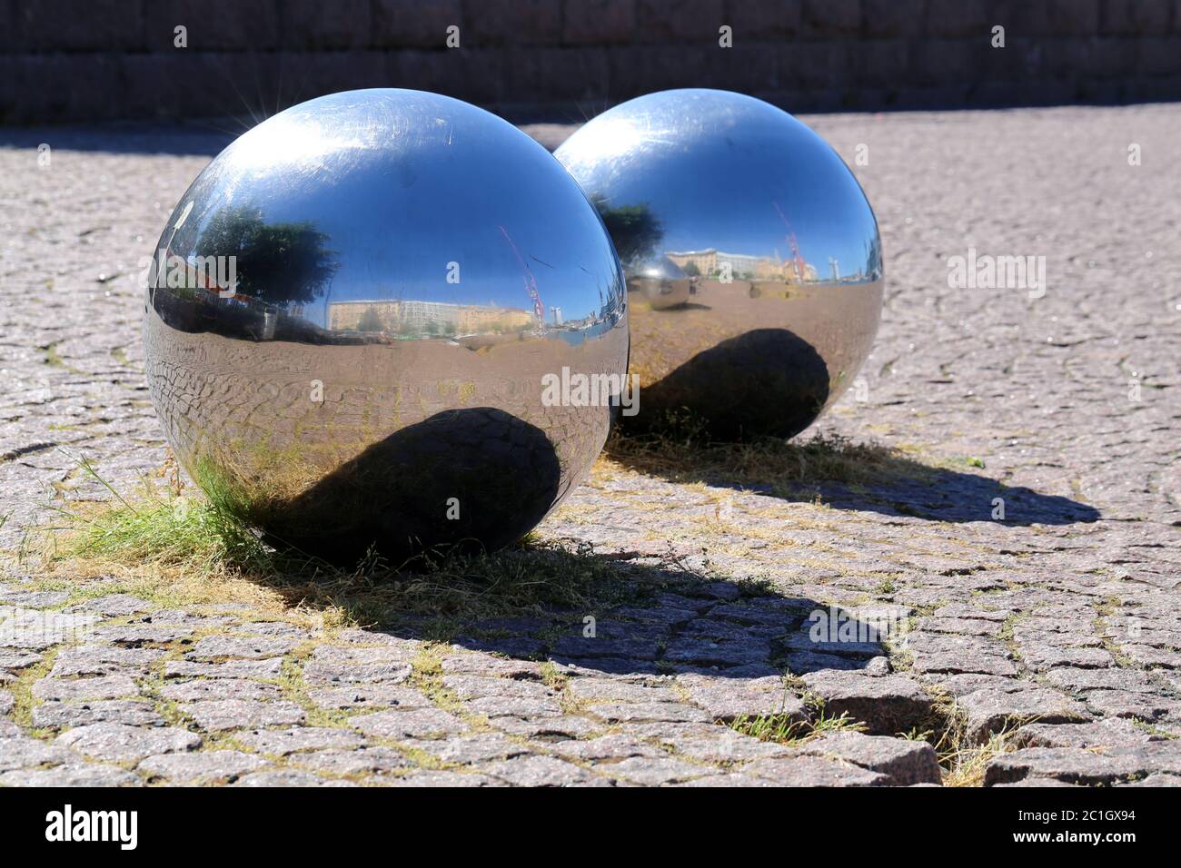 Mirror spheres in downtown Helsinki, Finland, June 2019. The iron balls ...