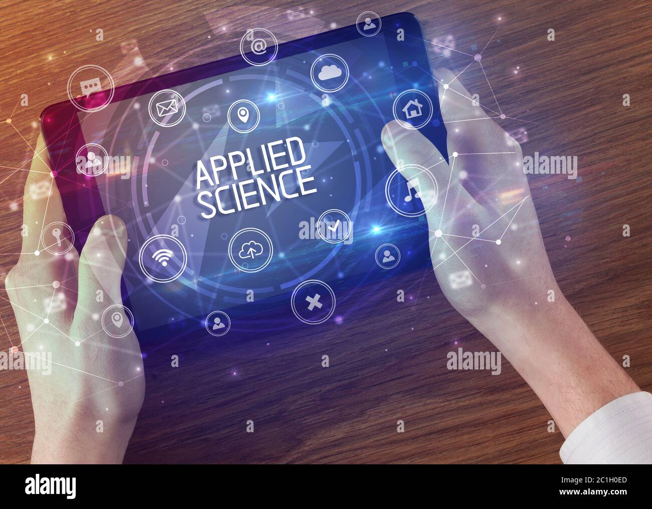 Close-up of a tablet with APPLIED SCIENCE inscription, innovative ...