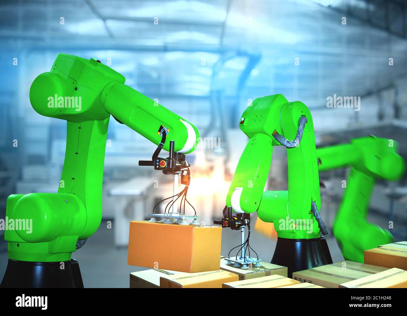 The Robotic arms carries cardboard box for delivery industry packing ...