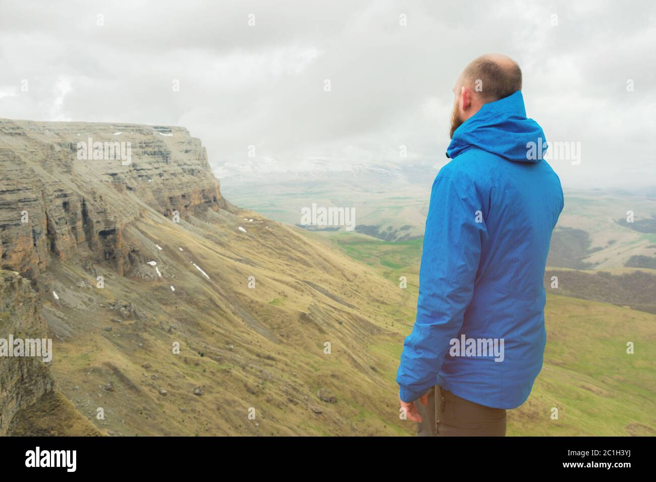 Man on edge hi-res stock photography and images - Alamy
