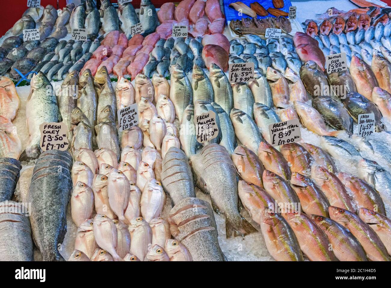 Great selection of fresh fish for sale at a market in Brixton, London ...