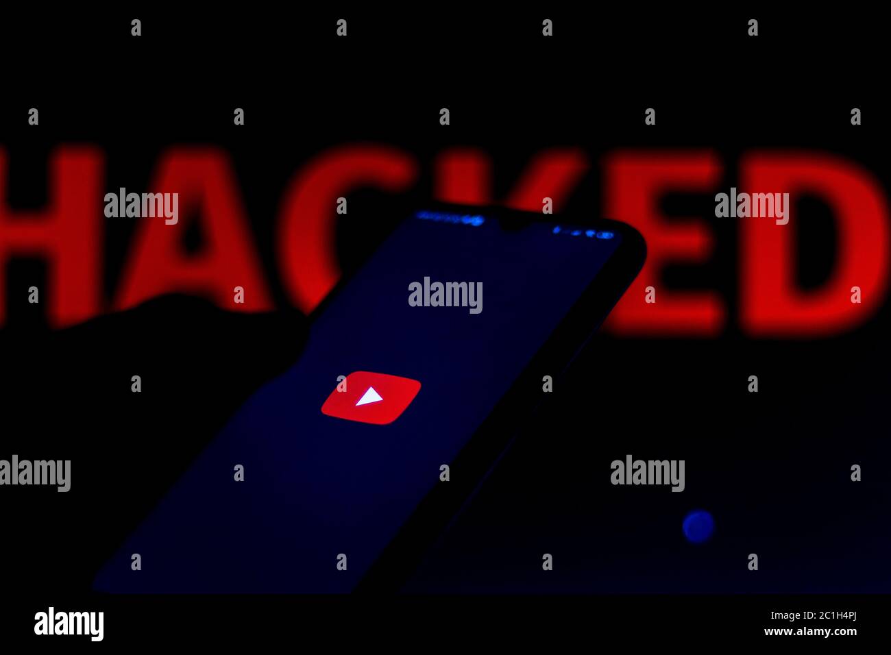 In this photo illustration the YouTube logo is displayed on a ...