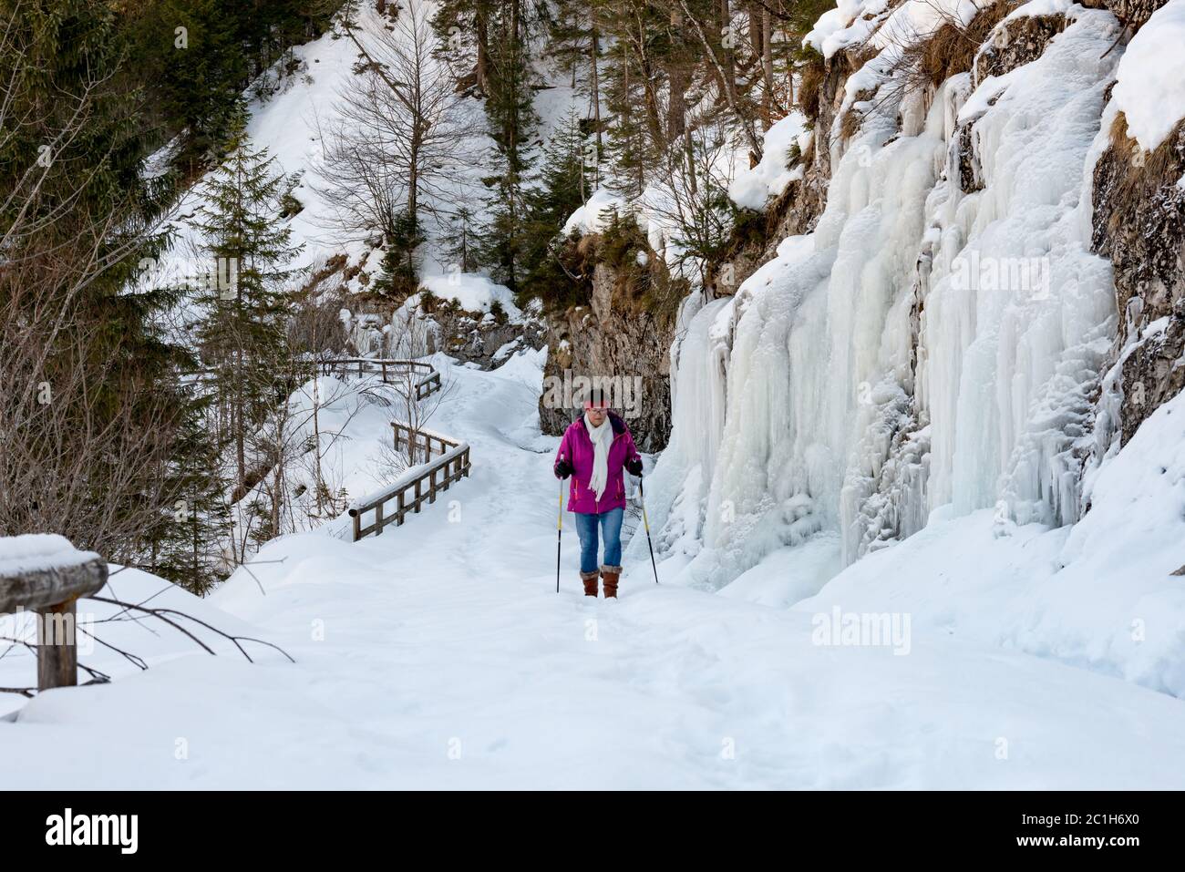 Winter hike to the frozen waterfall Stock Photo - Alamy