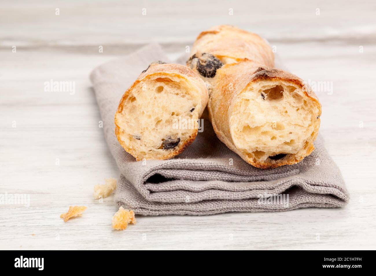 Delicious pastry. Olive baguette Stock Photo - Alamy