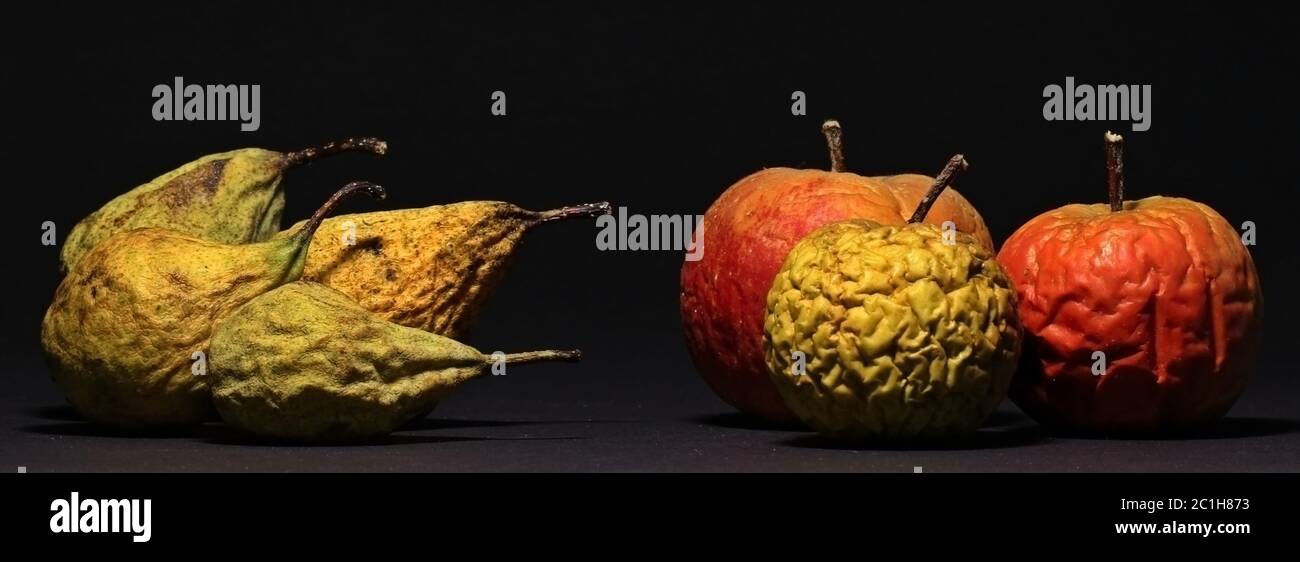 Conflict between apples and pears Stock Photo - Alamy