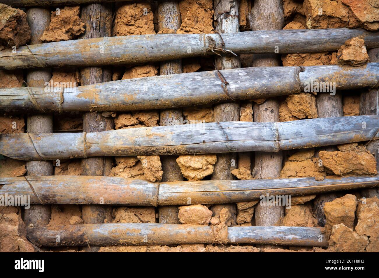 Old rustic cob wall with wood and mud Stock Photo - Alamy