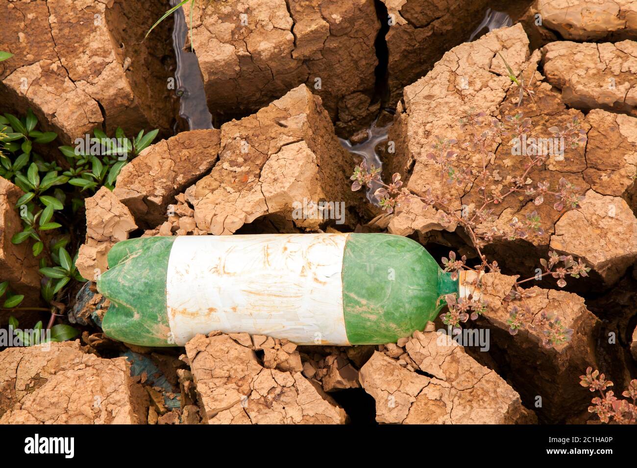 Drought soil with garbage in brazilian dam Stock Photo - Alamy