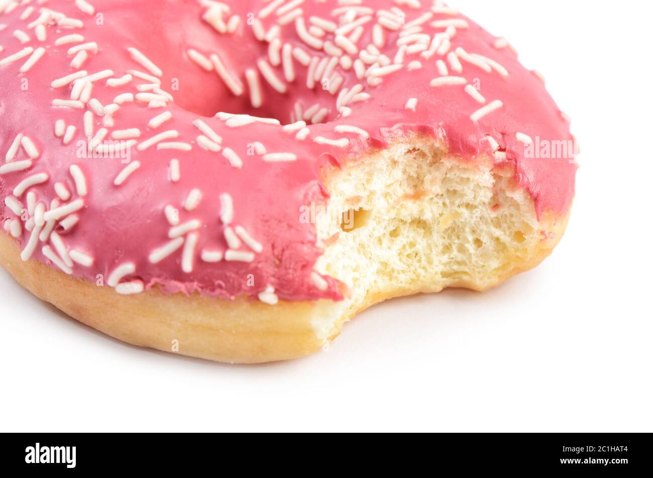 Bitten donut isolated on white background Stock Photo - Alamy