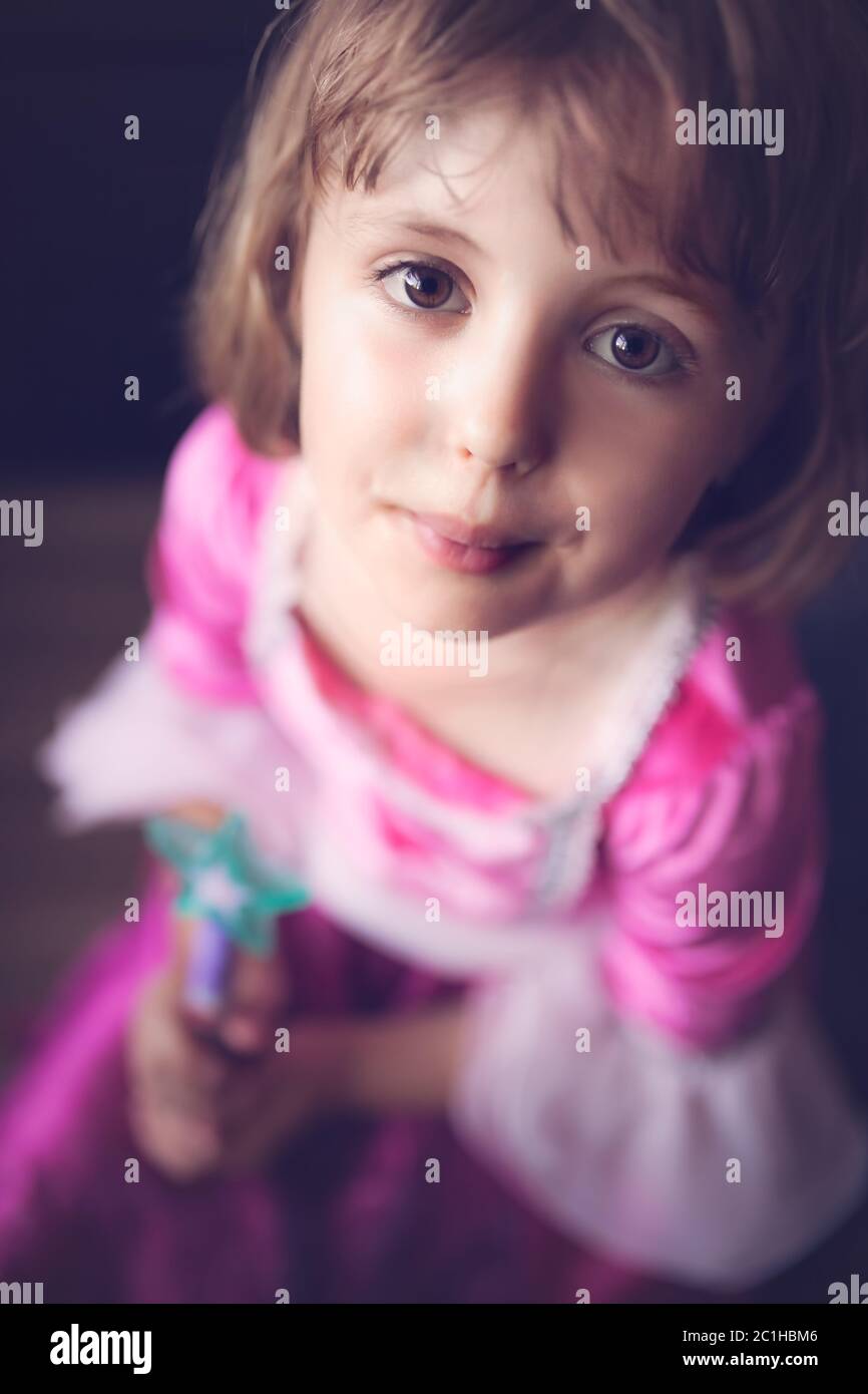 Little fairy princess looking up Stock Photo - Alamy