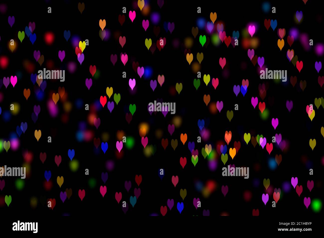 Multi colored hearts dark background for Valentine day Stock Photo - Alamy